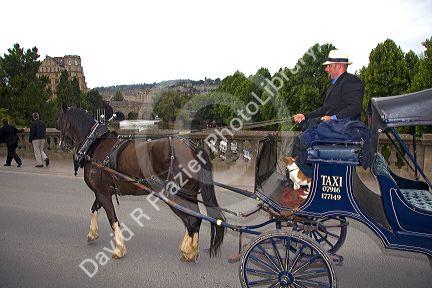 Horse drawn carriage taxi in the city of Bath, Somerset, England ...