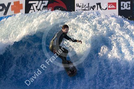 Man surfing on a man made wave machine at Mission Beach, San Diego ...