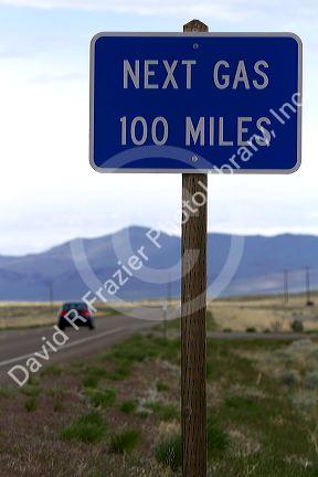 Next gas 100 miles road sign at the Oregon/Nevada border in McDermitt ...